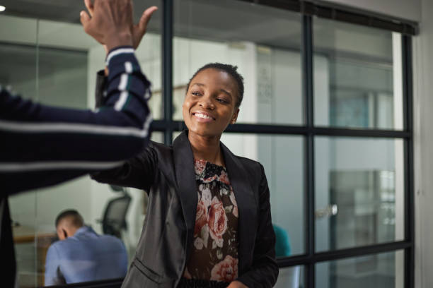 Free Stock Photo of Coworkers giving high five in the office | Download ...