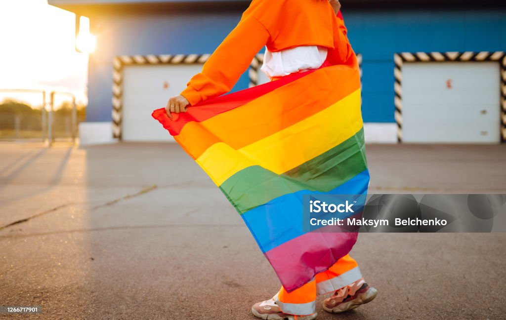 Beautiful African American Lesbian Woman With Lgbt Rainbow Flag At