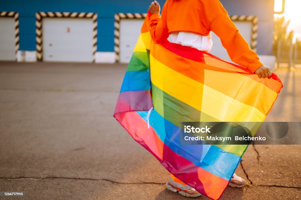Beautiful African American Lesbian Woman With Lgbt Rainbow Flag At