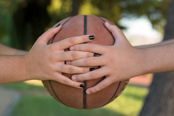 Free Stock Photo of Two Hands Holding a Basketball | Download Free ...
