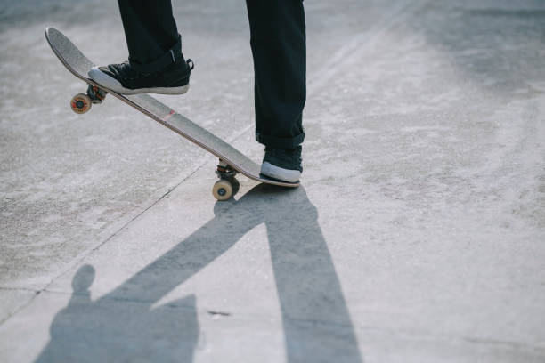Free Stock Photo of Skateboard in shadow on concrete ground | Download ...