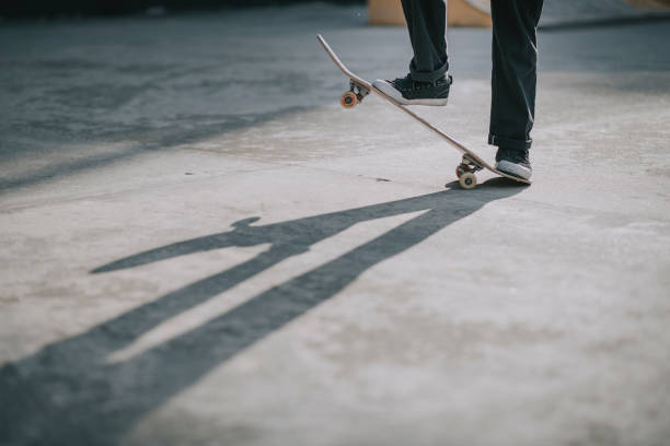 Free Stock Photo of Skateboard in shadow on concrete ground | Download ...