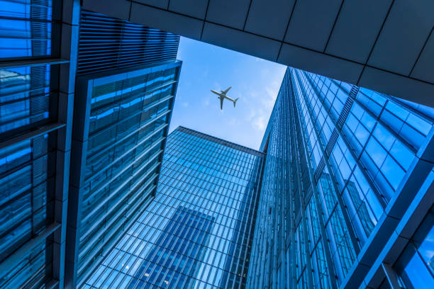 Free Stock Photo of Airplane Flying Over Building With Sky Background ...