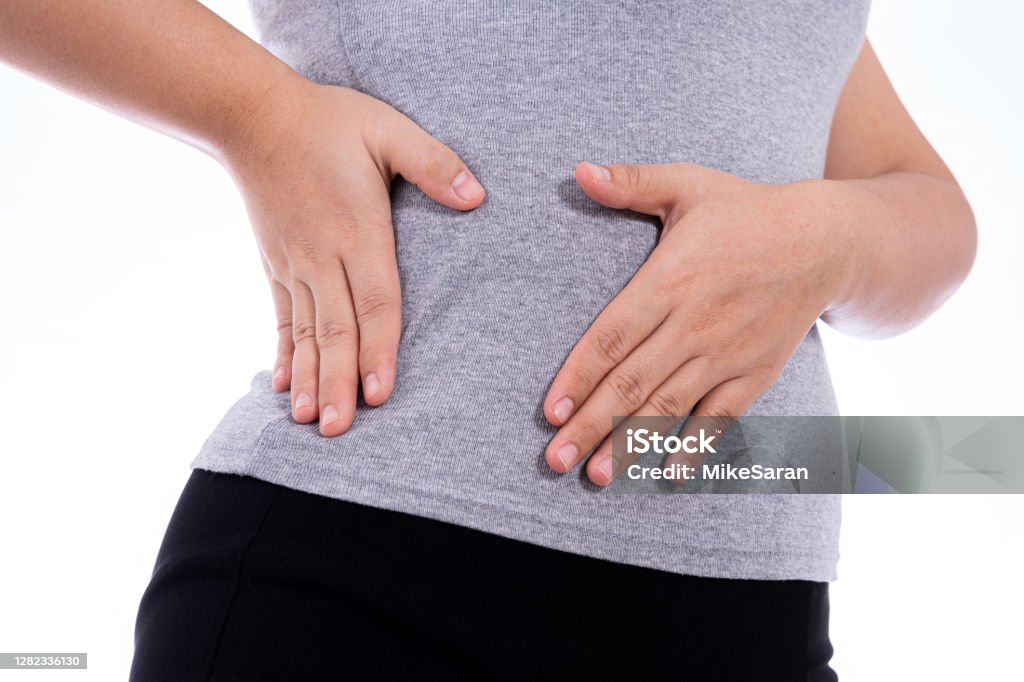Foto de Mão Da Mulher Tocando Estômago Cintura Ou Posição Hepática De ... Foto de Mão Da Mulher Tocando Estômago Cintura Ou Posição Hepática De ...
