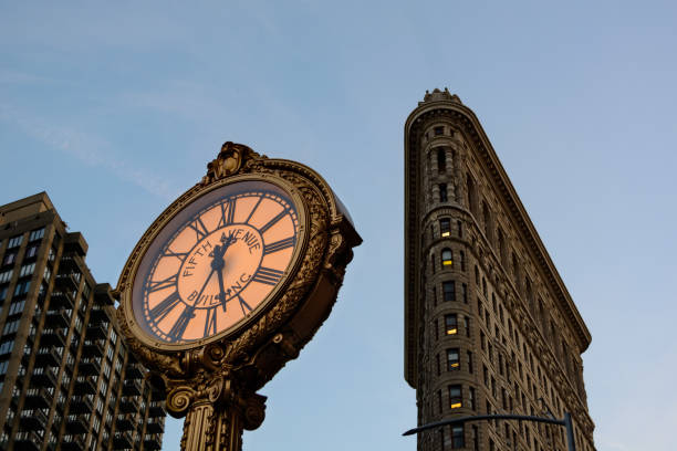 Free Stock Photo of Clock on Pole in Front of Tall Building | Download Free Images and Free ...