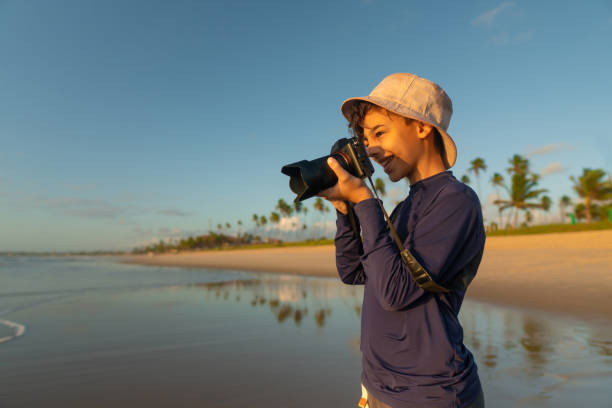 Free Stock Photo of Holding a camera at the beach | Download Free ...