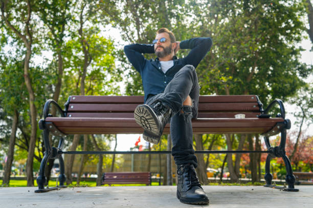 Free Stock Photo of Person Sitting on Bench With Feet Up | Download ...