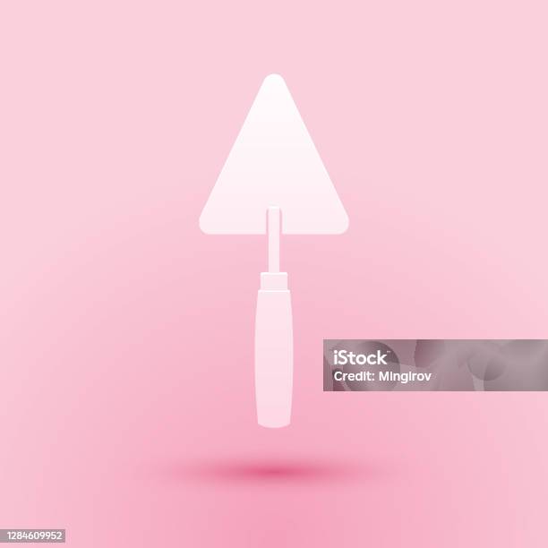 Icône De Truelle Coupée De Papier Isolée Sur Le Fond Rose Style Dart En