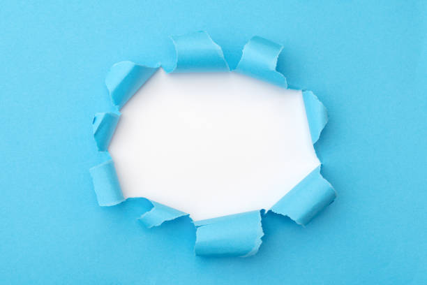 Free Stock Photo of A wide hole ripped through paper sheet | Download ...