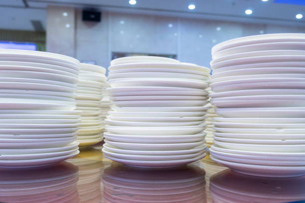 Free Stock Photo of Stack of assorted dinner plates on shelf | Download ...