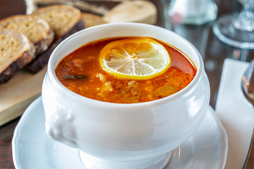 Hot Fresh Hodgepodge With Lemon Grey Bread Served On The Wooden Table Of Restaurant Russian