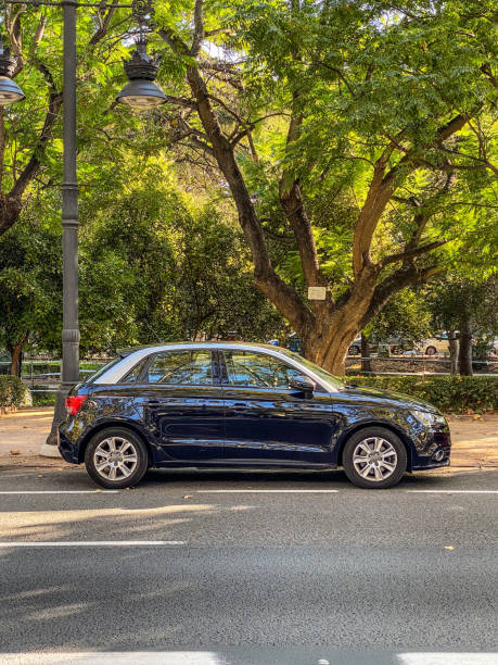 Free Stock Photo of Car Parked in Field Next to Tree | Download Free ...
