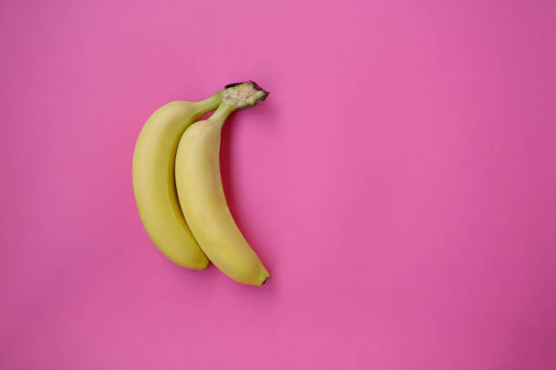 Free Stock Photo of A Single Banana on a Pink Background | Download ...