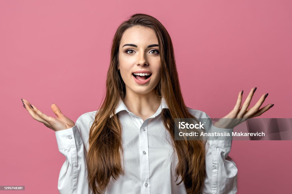 Surprised And Happy Brunette Girl Express Overjoy And Surprised Spread