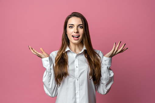 Surprised And Happy Brunette Girl Express Overjoy And Surprised Spread