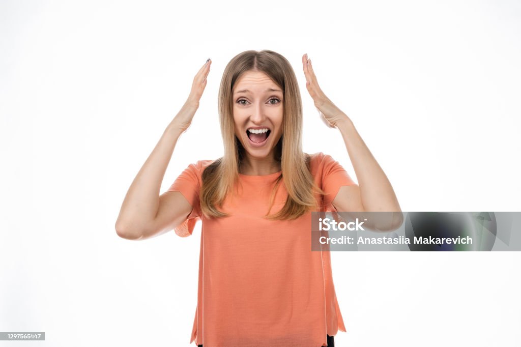 Surprised And Happy Blond Girl Express Overjoy And Surprised Smiling