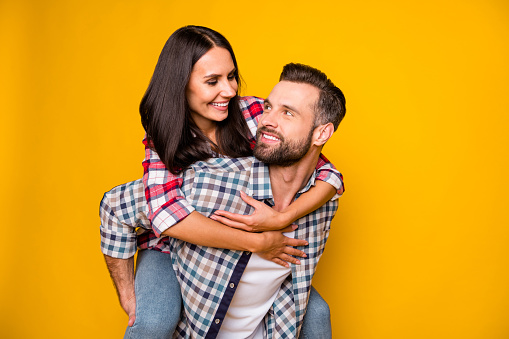 Photo Portrait Of Woman Riding Mans Back Looking At Each Other Isolated