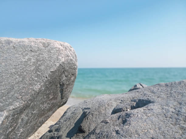 Free picture: Big smooth rocks in the ocean – artificial intelligence photo