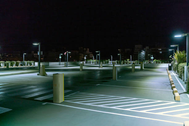 Free Stock Photo of Neon Signs Illuminating Empty Night Parking Lot ...