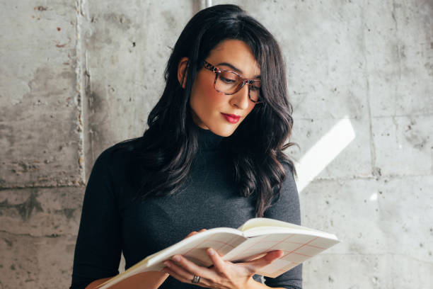 Free Stock Photo of Woman engrossed in reading a book | Download Free Images and Free Illustrations