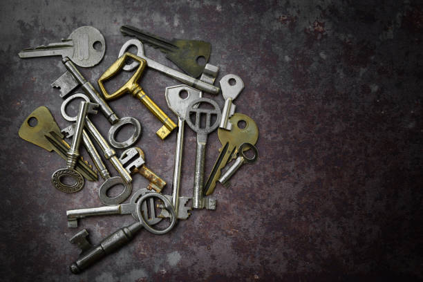 Free Stock Photo of Close-up of a bunch of keys on dark surface ...