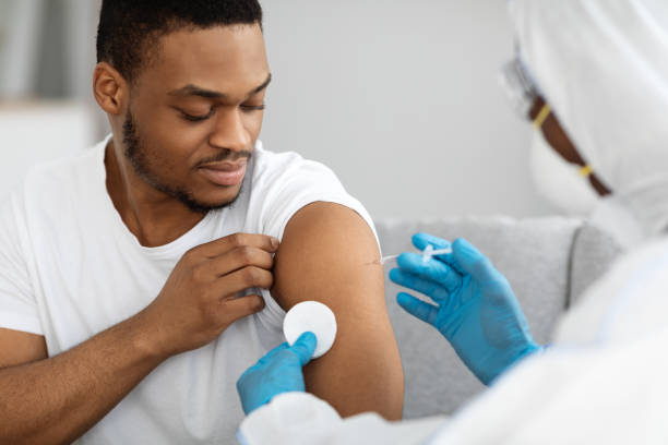 210+ Black Man Receiving Vaccine Stock Photos, Pictures & Royalty-Free ... 210+ Black Man Receiving Vaccine Stock Photos, Pictures & Royalty-Free ...