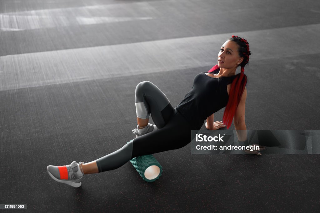 Woman Massaging Foam Roll Leg Gym Myofascial Release Exercise Rolling
