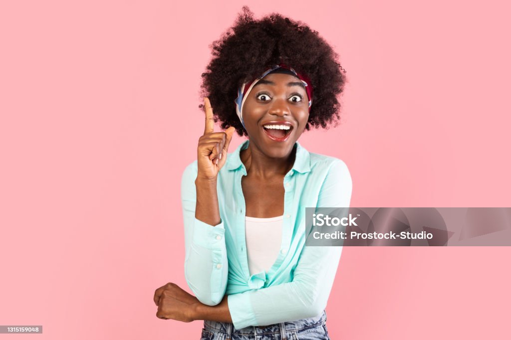 Excited African Woman Pointing Finger Up Having Idea Pink Background