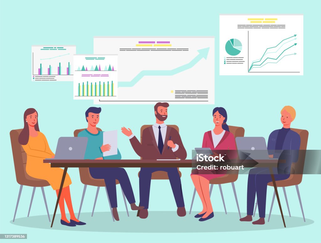 Business People At Table Use Laptops Whiteboards With Analytic Data
