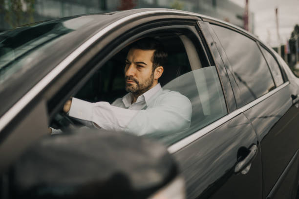 Free Stock Photo of Man Driving Car With City Background | Download ...