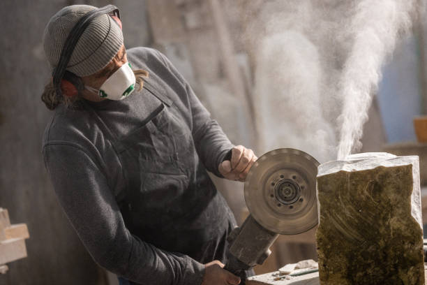Free Stock Photo of Male carpenter wearing protective mask using ...