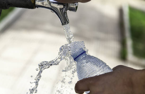 Free Stock Photo of Close Up of Water Bottle Being Filled With Water ...