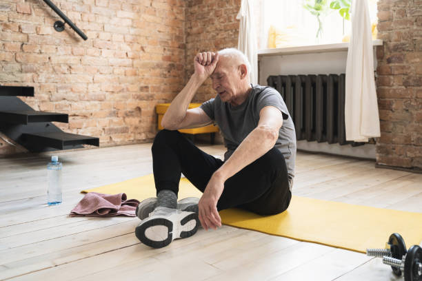 Free Stock Photo of Elderly man resting on a bench after a workout ...
