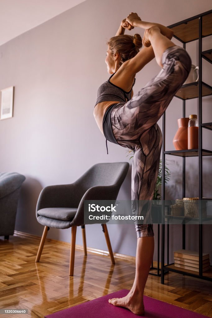 Flexible Yogi Doing A Dancer Pose While Practicing Yoga Stock Photo ... Flexible Yogi Doing A Dancer Pose While Practicing Yoga Stock Photo ...