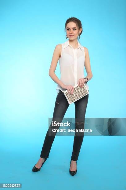 Young Beautiful Woman In A Summer Outfit In A Seethrough White Shirt