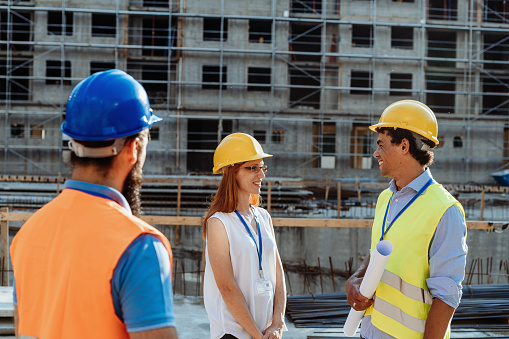 Female Construction Site Manager Giving Instructions To Employees Stock ... Female Construction Site Manager Giving Instructions To Employees Stock ...