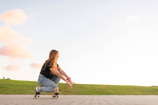 Free Stock Photo of Skateboarder cruising down city street | Download ...