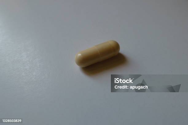 Photo Libre De Droit De Vue Rapprochée Dune Capsule Beige Dextrait De