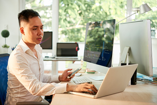 Developer Checking Programming Code Stock Photo - Download Image Now ... Developer Checking Programming Code Stock Photo - Download Image Now ...