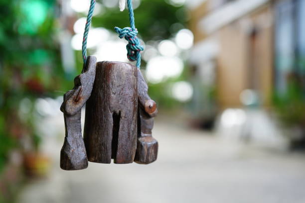 Free Stock Photo of Small Wooden Figure Hanging on Rope | Download Free ...