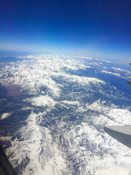 Free Stock Photo of Snowy Mountain Range View From Airplane Window ...