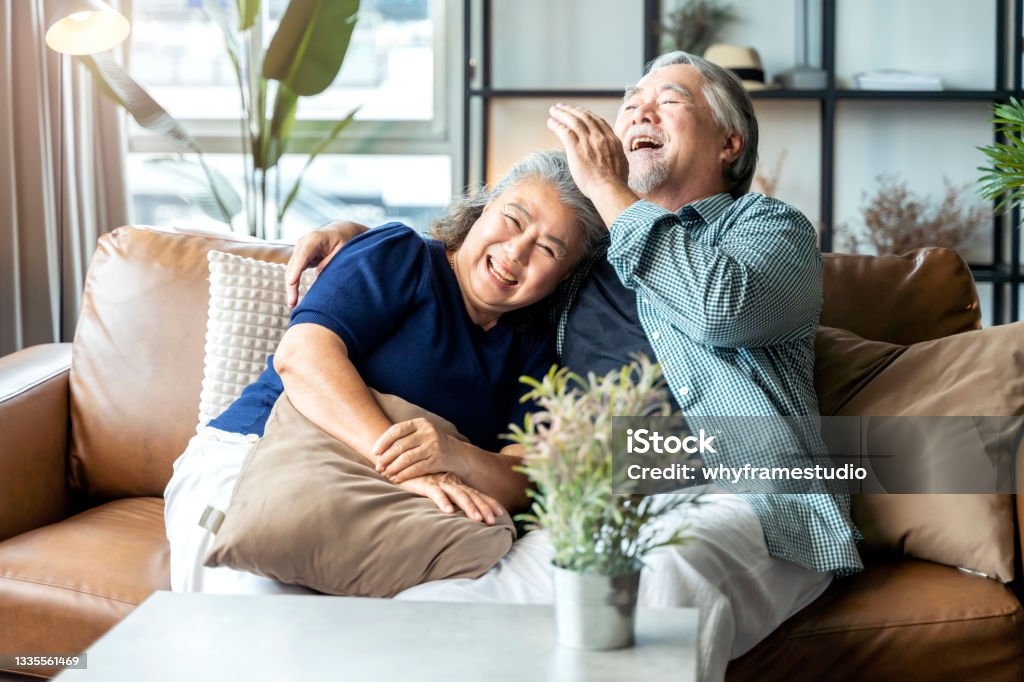 Old Senior Asian Retired Couple Enjoy Talking Conversation Together On