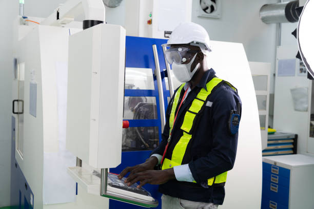 Free Stock Photo of Workers producing surgical masks in modern factory ...