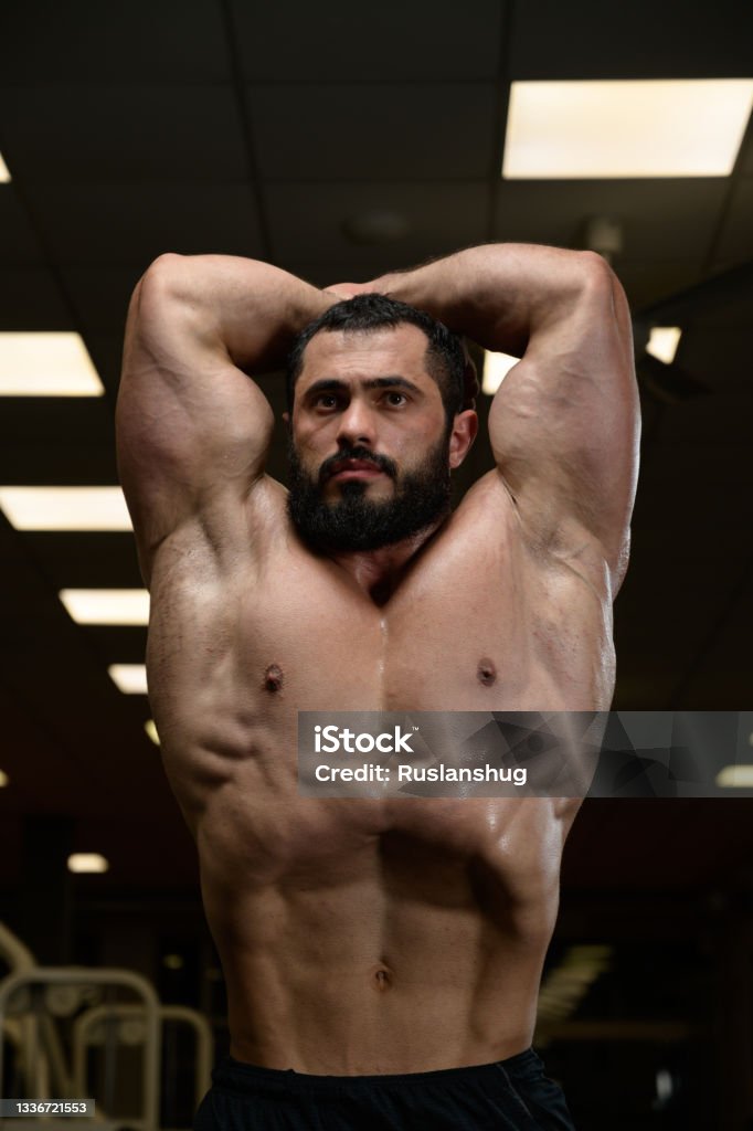 Vacuum Pose Of Strong Young Caucasian Bearded Muscular Man Fitness ... Vacuum Pose Of Strong Young Caucasian Bearded Muscular Man Fitness ...