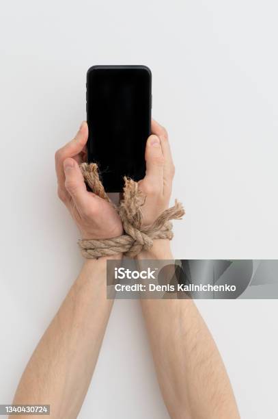 Internet Addiction Or Social Media Addiction Hands Tied With A Rope ... Internet Addiction Or Social Media Addiction Hands Tied With A Rope ...