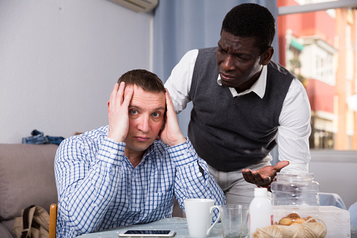 African Man Soothing Offended Friend Stock Photo - Download Image Now ... African Man Soothing Offended Friend Stock Photo - Download Image Now ...