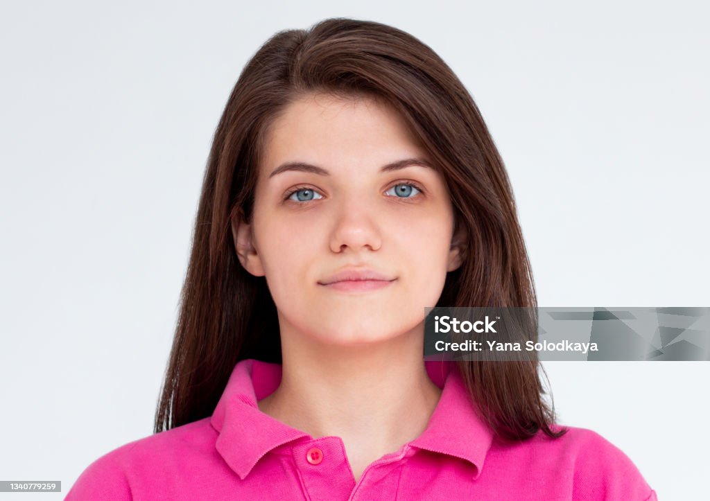 Portrait Of Young Beautiful Cute Cheerful Girl Smiling Looking At