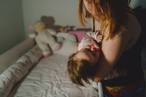 Small Caucasian Baby Going To Sleep Hands Of Unknown Woman Mother ... Small Caucasian Baby Going To Sleep Hands Of Unknown Woman Mother ...