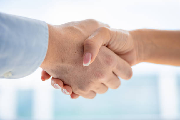 Free Stock Photo of Polite handshake between two business people ...