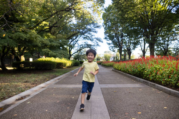 Free Stock Photo of Young Boy Running Down the Road | Download Free ...
